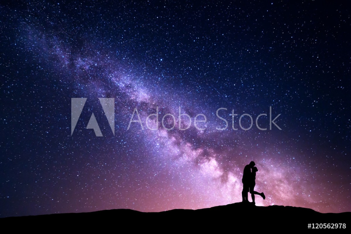 Milky Way Night landscape with silhouettes of hugging and kissing man ...